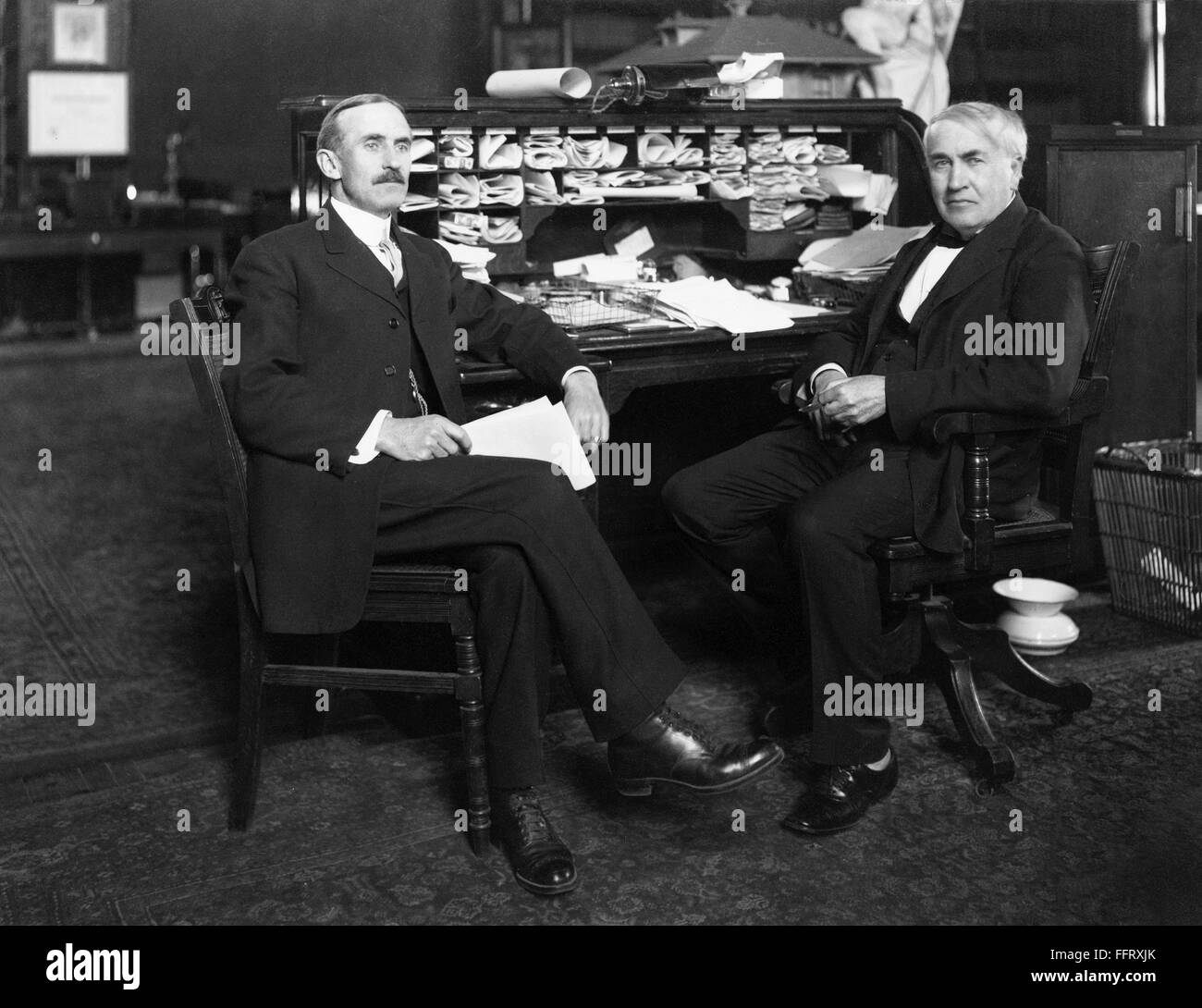 THOMAS EDISON (1847-1931). /nAmerican inventor. Photographed seated at ...