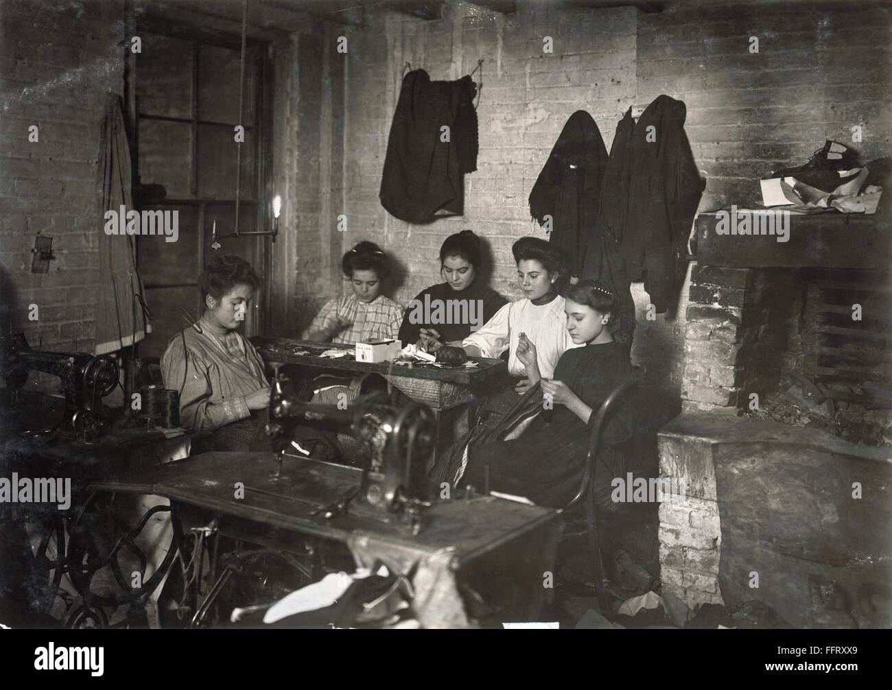 HINE: SWEATSHOP, 1908. /nGroup of women sewing garments in a sweatshop ...