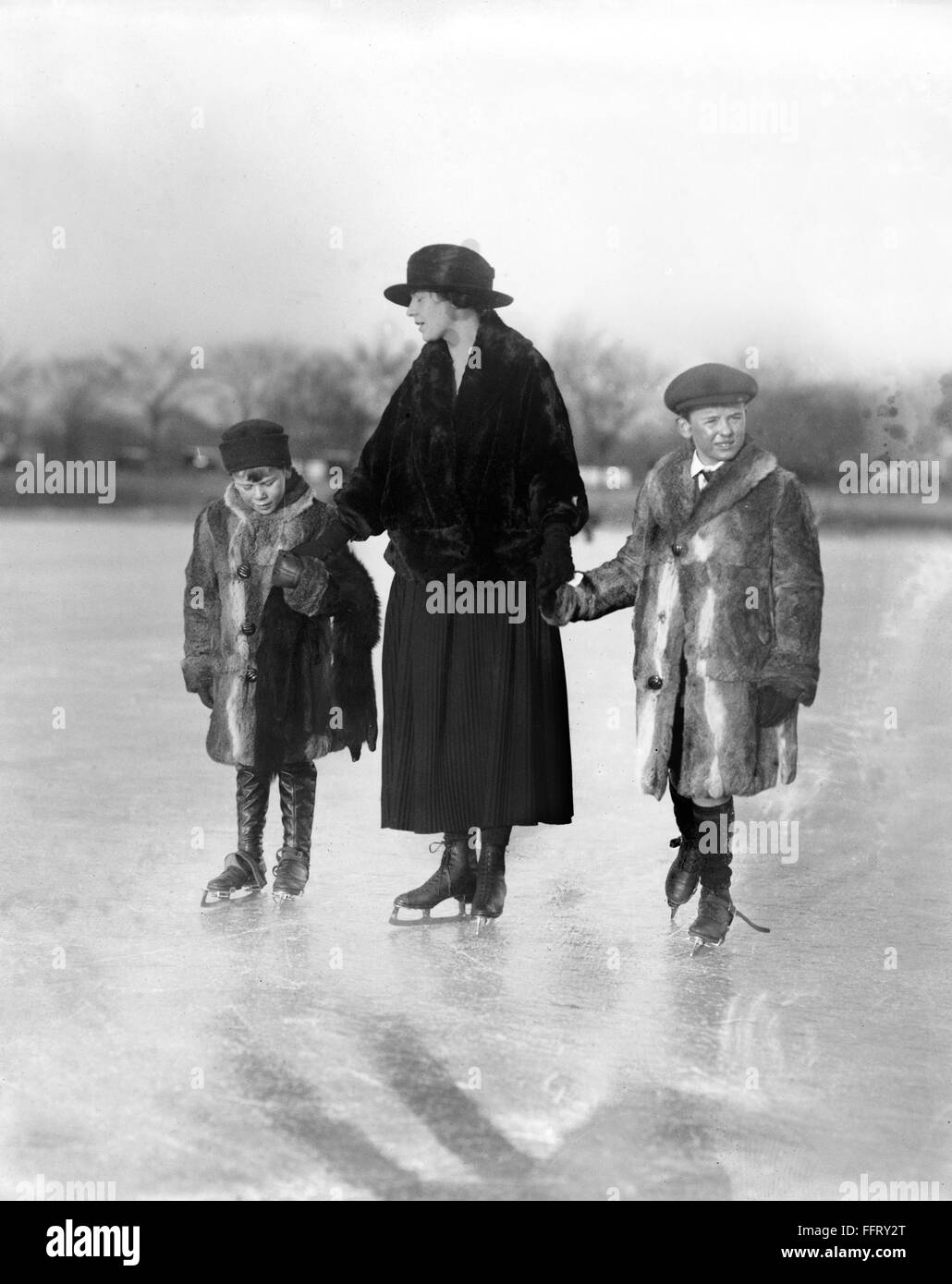 ICE SKATERS, c1919. /nA woman identified as Miss Dorthy with two ...