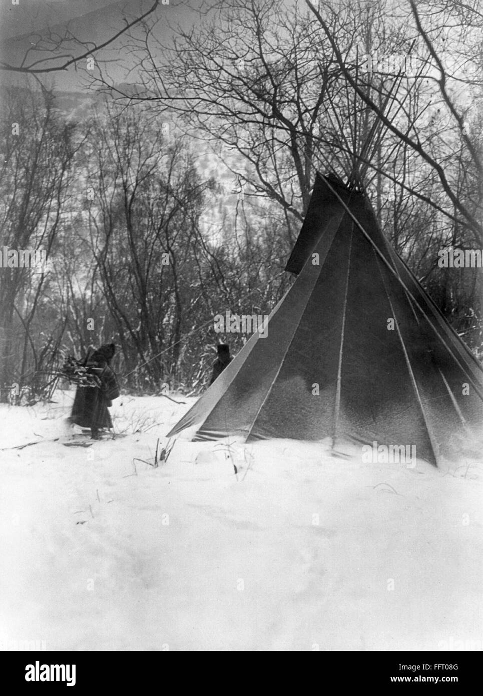 SIOUX TIPI, c1908. /nA Sioux Native American woman approaching her tipi ...