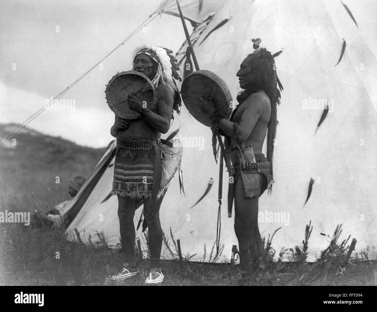 SIOUX PLAYING DRUMS, c1908. /nTwo Sioux Native American men playing ...