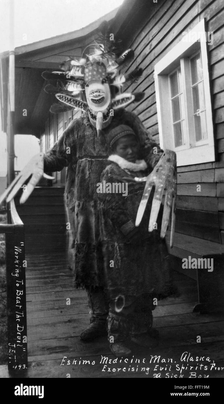 ALASKA: MEDICINE MAN. /nAn Alaskan Inuit medicine man with a sick boy ...