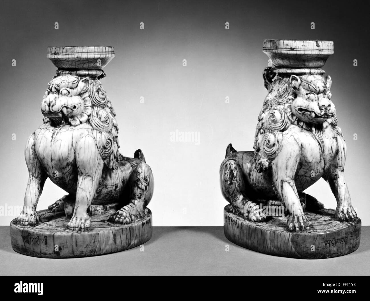 NEPAL: IVORY LIONS. /nCarved ivory lions from Nepal, 12th century Stock ...