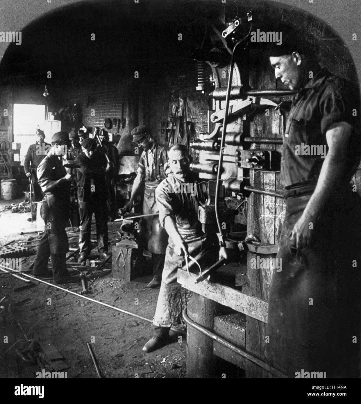 PENNSYLVANIA: BLACKSMITH. /nMen working with a pneumatic steam hammer ...