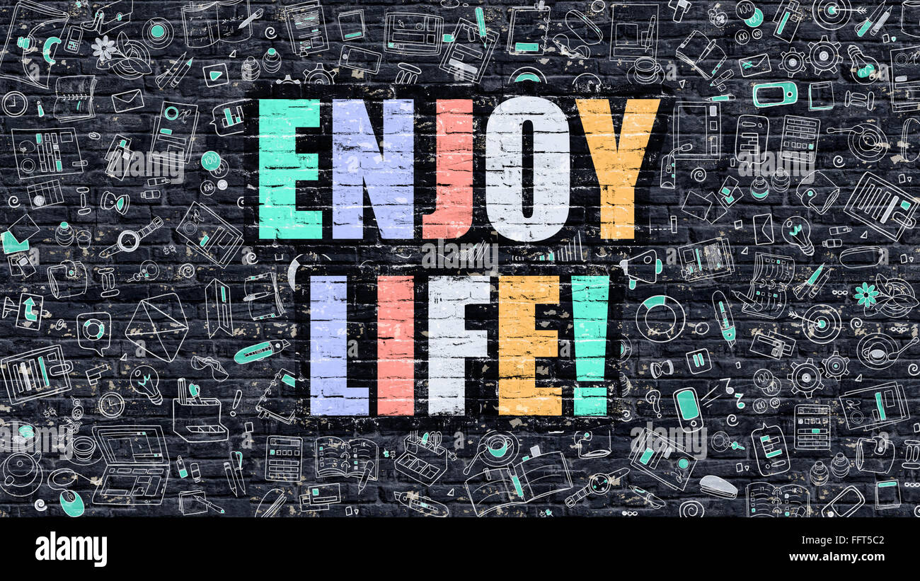 Multicolor Enjoy Life on Dark Brickwall. Doodle Style Stock Photo - Alamy