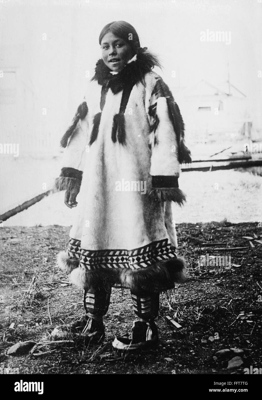 ESKIMO GIRL. /nEskimo girl wearing traditional clothing. Photograph ...