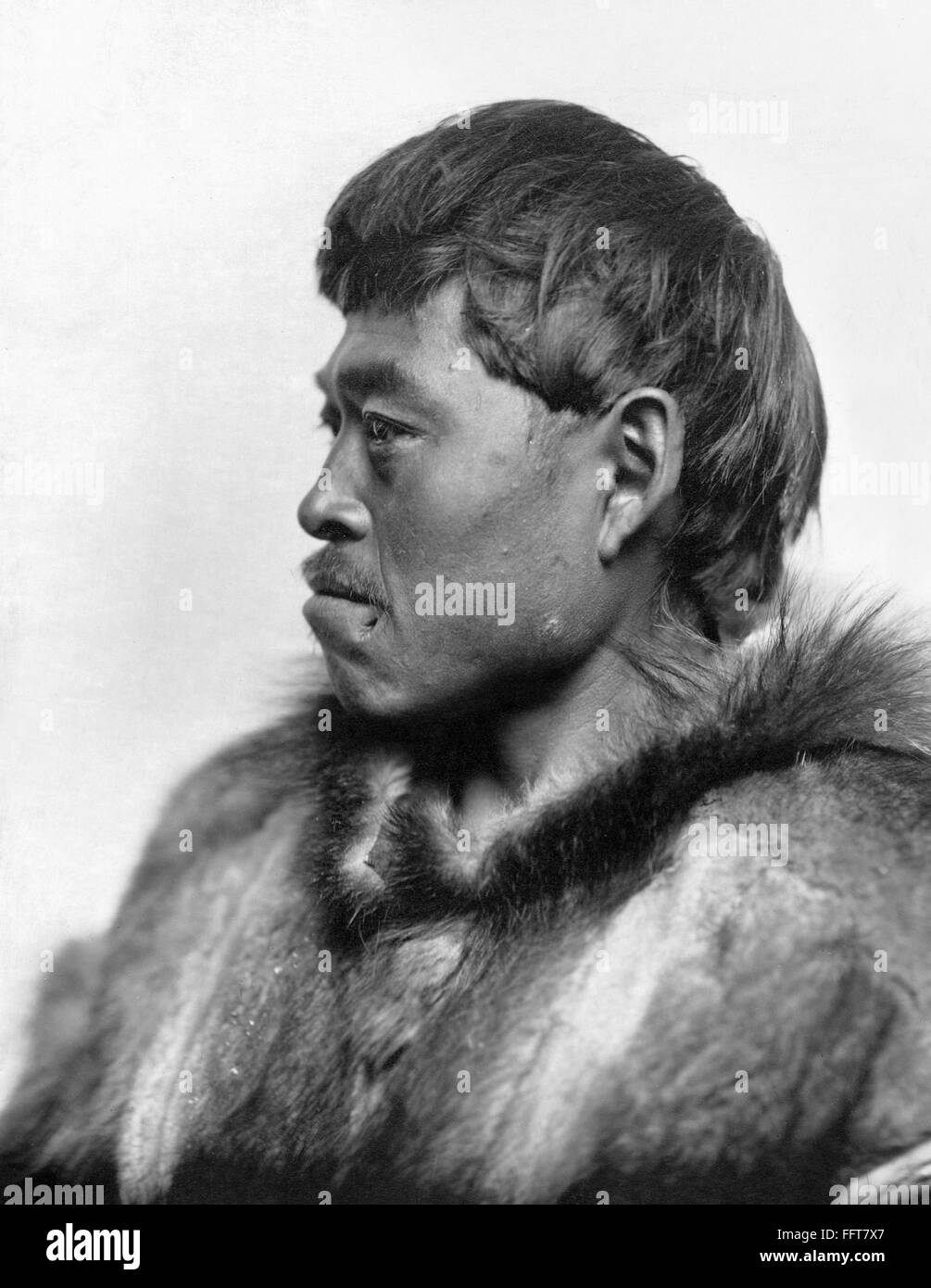 ALASKA: ESKIMO MAN, c1916. /nEskimo man in profile wearing a fur coat ...