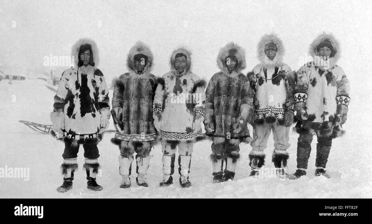 ALASKA: ESKIMOS. /nA group of six Eskimo men posing in the snow in ...