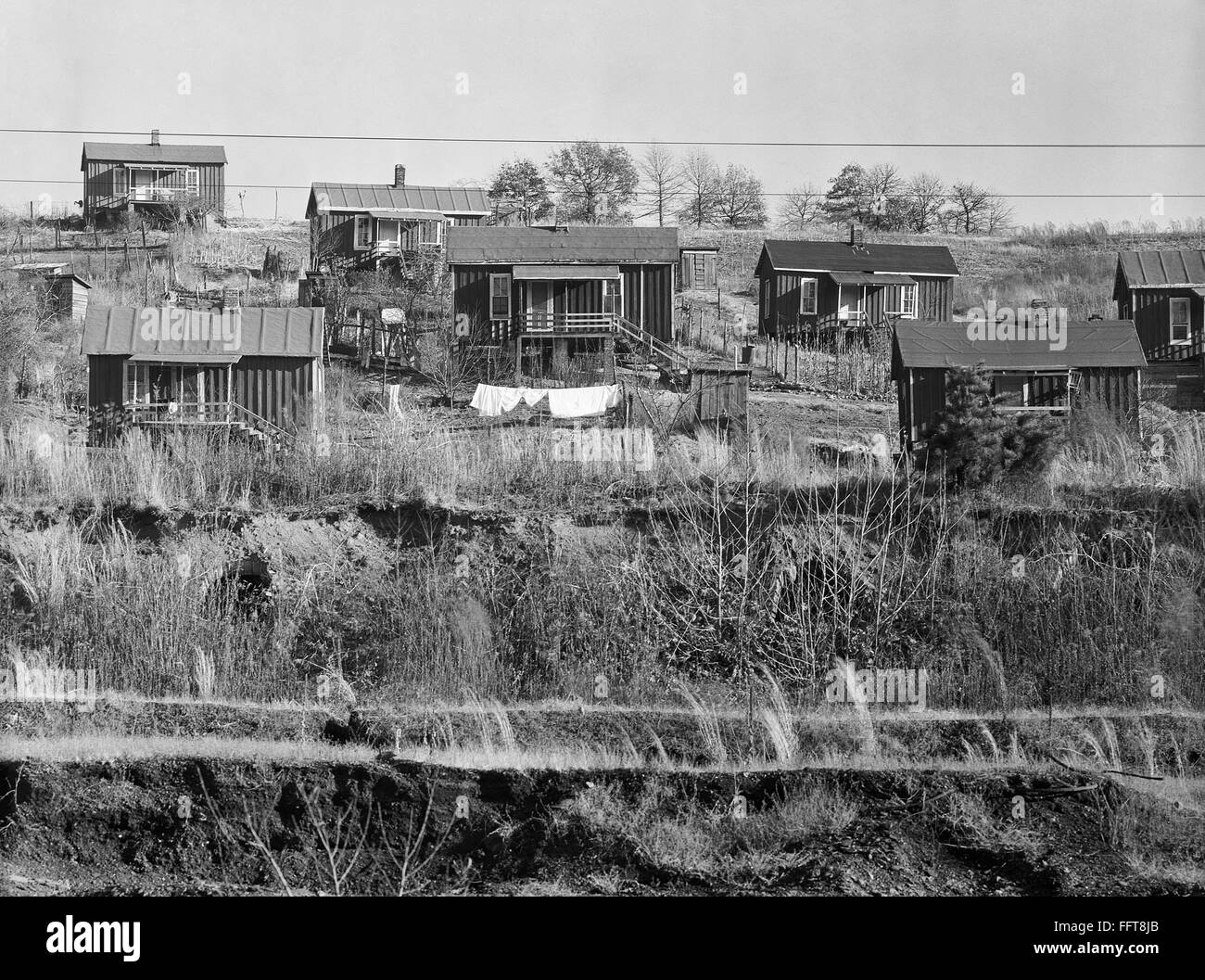 MINERS' HOMES, 1935. /nA group of miners' houses near Birmingham ...