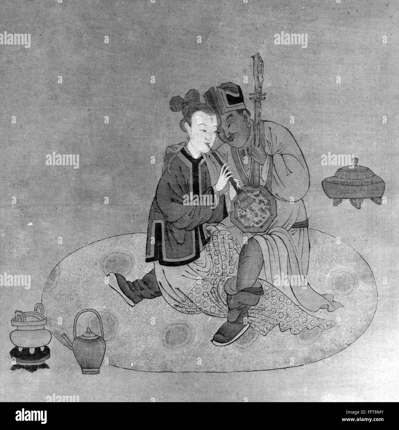 CHINA: OFFICER & LADY. /nA Tartar officer with a blonde lady playing a ...