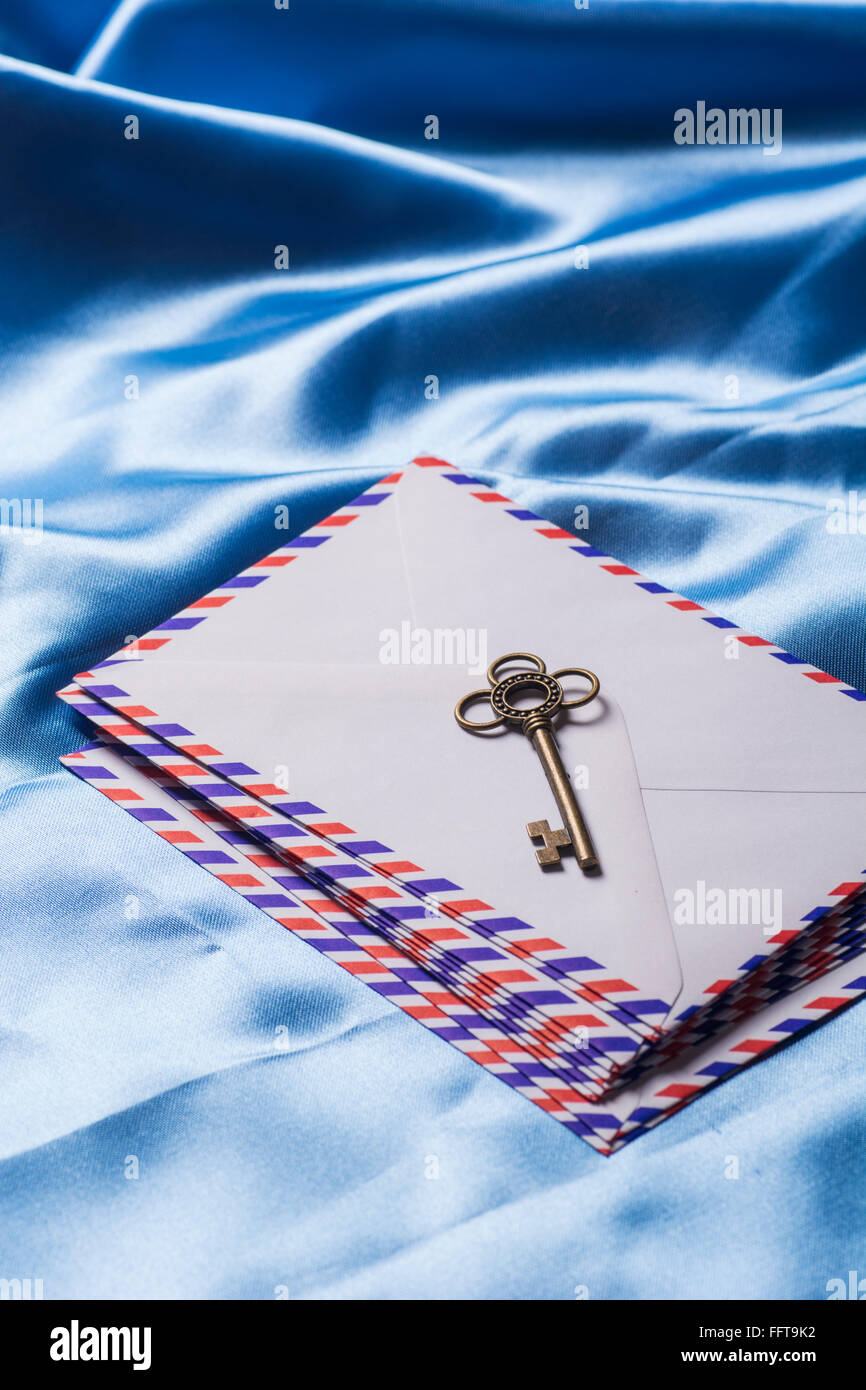 Old key over letters Stock Photo - Alamy