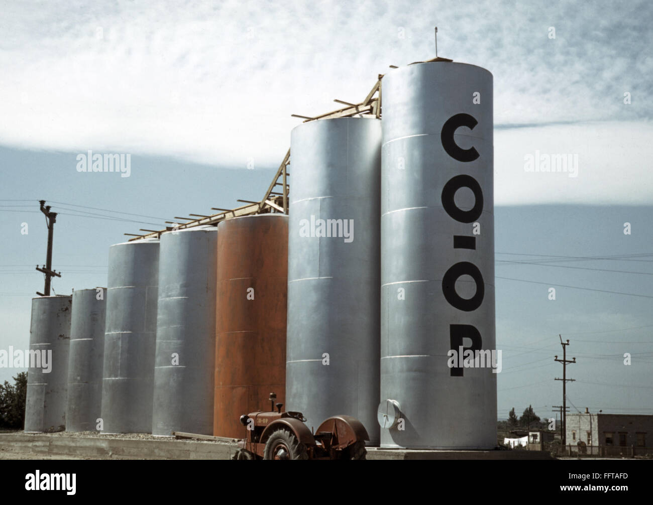 GRAIN ELEVATORS, 1941. /nA row of cooperative grain elevators in ...