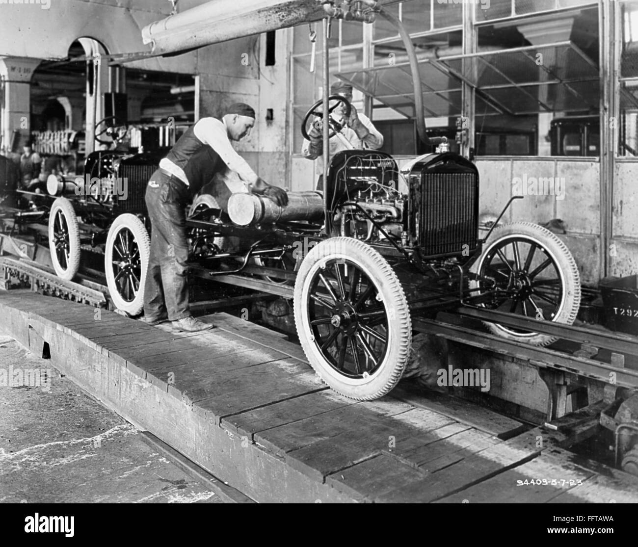 AUTOMOBILE FACTORY, c1923. /nAssembly line workers at an American ...