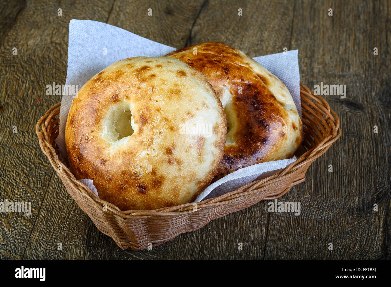 Traditional Uzbek bread on the wood background Stock Photo - Alamy