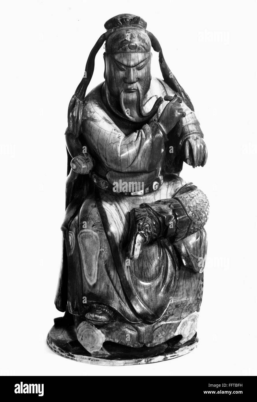 CHINA: WAR GOD. /nSeated ivory figure of Kuan Ti, the Taoist god of war ...
