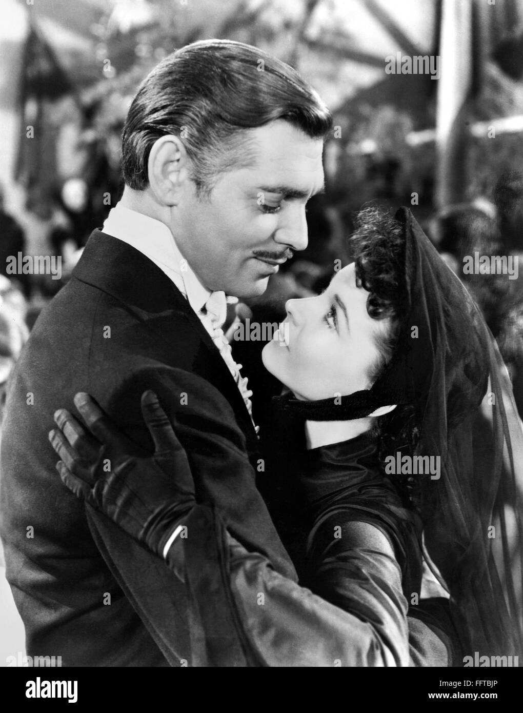 GONE WITH THE WIND, 1939. /nVivien Leigh as Scarlett O'Hara and Clark Gable as Rhett Butler in ...