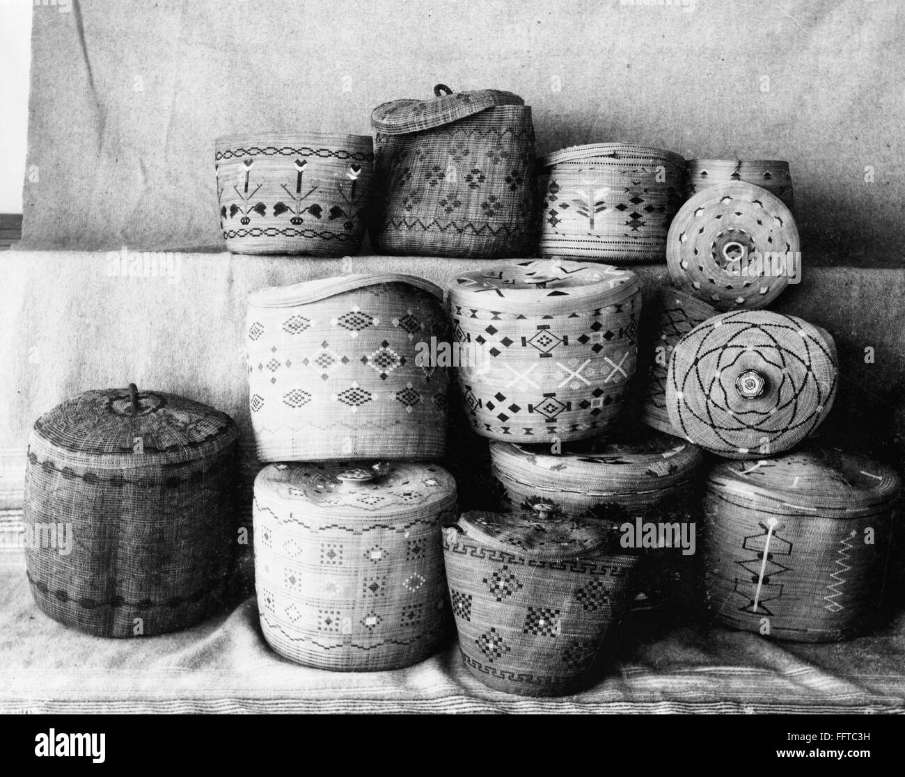 ALASKA: BASKETS, c1899. /nA group of Aleutian woven baskets with covers ...