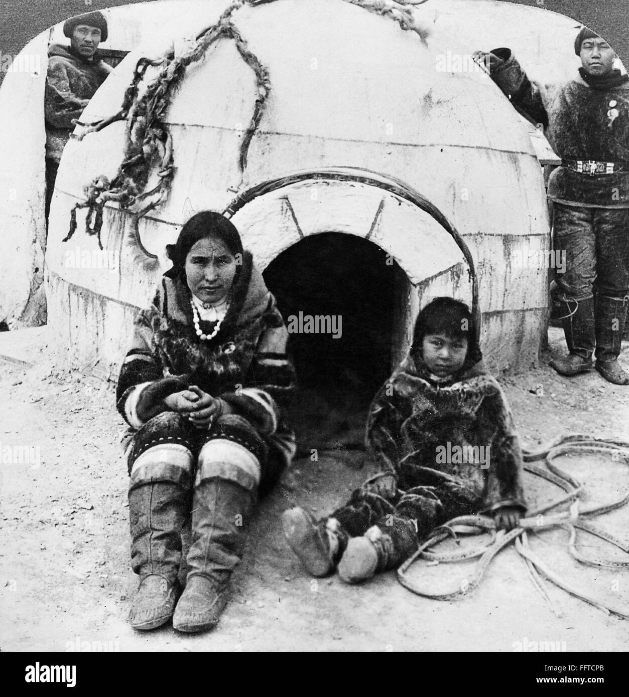 WORLD'S FAIR: ESKIMOS. /nAn Eskimo woman and a young boy sitting ...