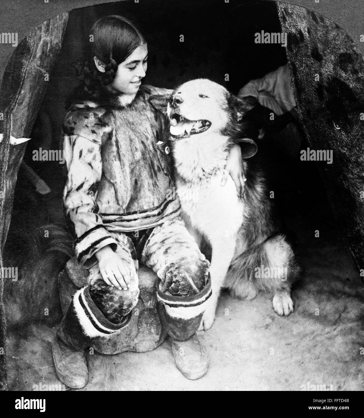 WORLD'S FAIR: ESKIMOS. /nAn Eskimo girl with her dog. The girl is ...