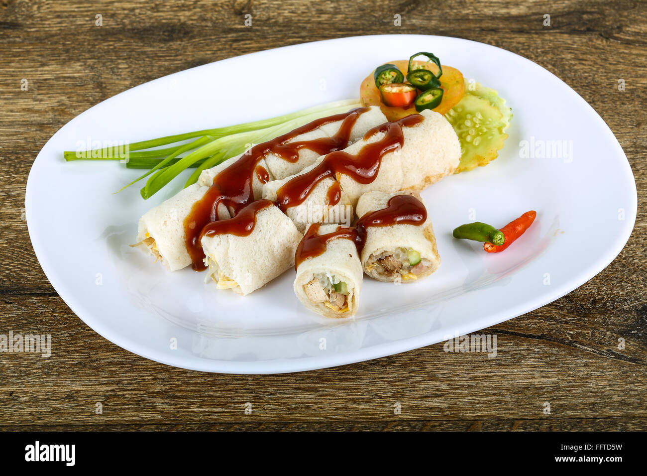 Spring rolls with tamarind sauce and spices Stock Photo - Alamy
