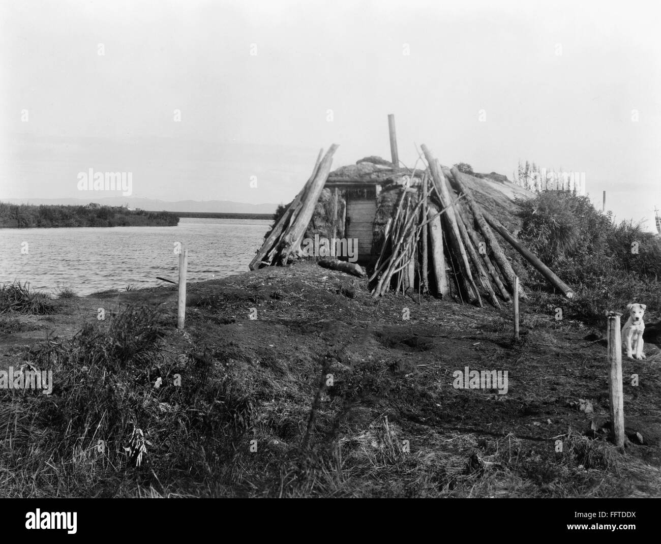 ALASKA: ESKIMO HOUSE. /nA log and sod hut on the banks of the Selawik ...