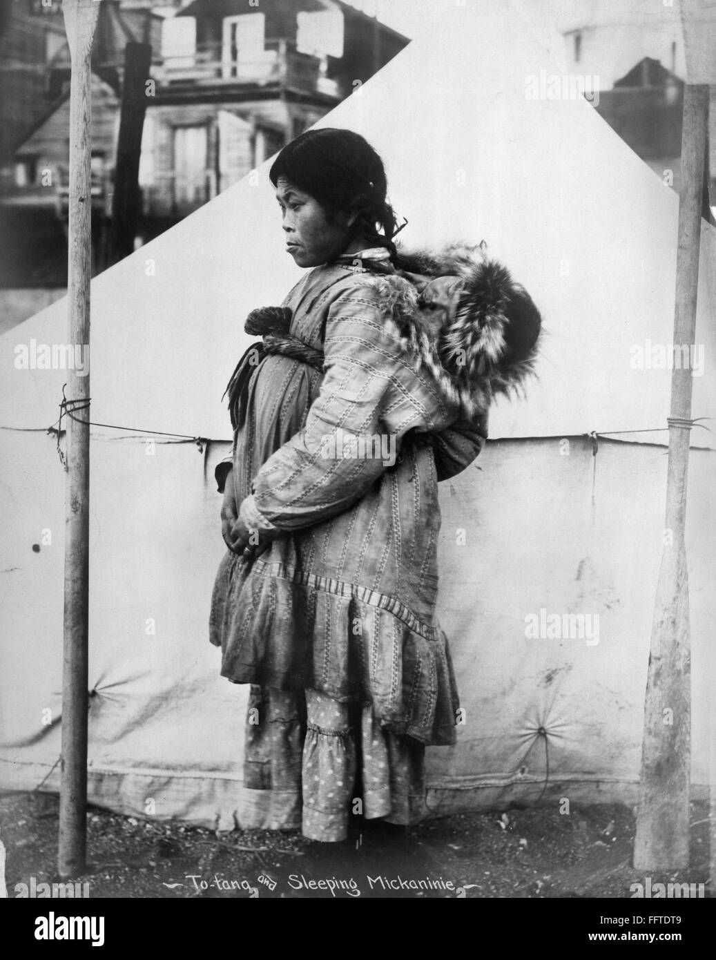 ESKIMO WOMAN AND CHILD. /nAn Eskimo woman carrying a baby on her back ...