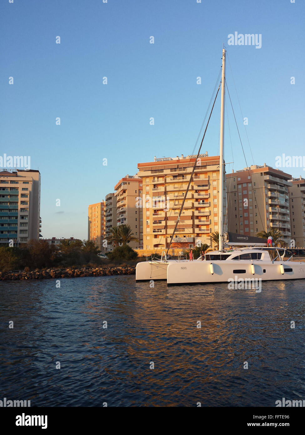 catamaran sailing at sunset Stock Photo - Alamy