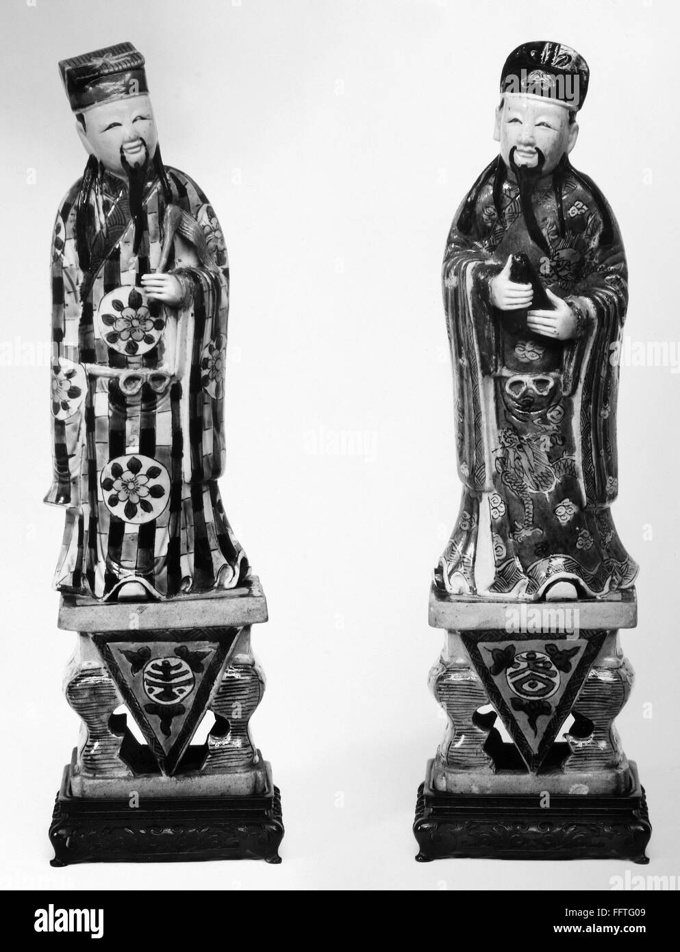 CHINA: IMMORTALS FIGURES. /nPorcelain figures of two of the Eight ...
