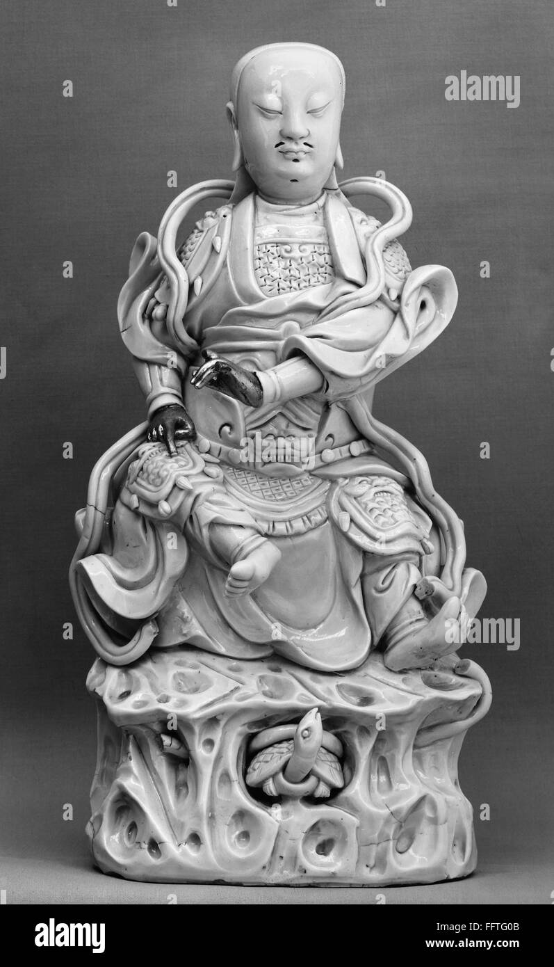 CHINA: TAOIST DEITY. /nGlazed white porcelain figure of Xuan Wu, the ...