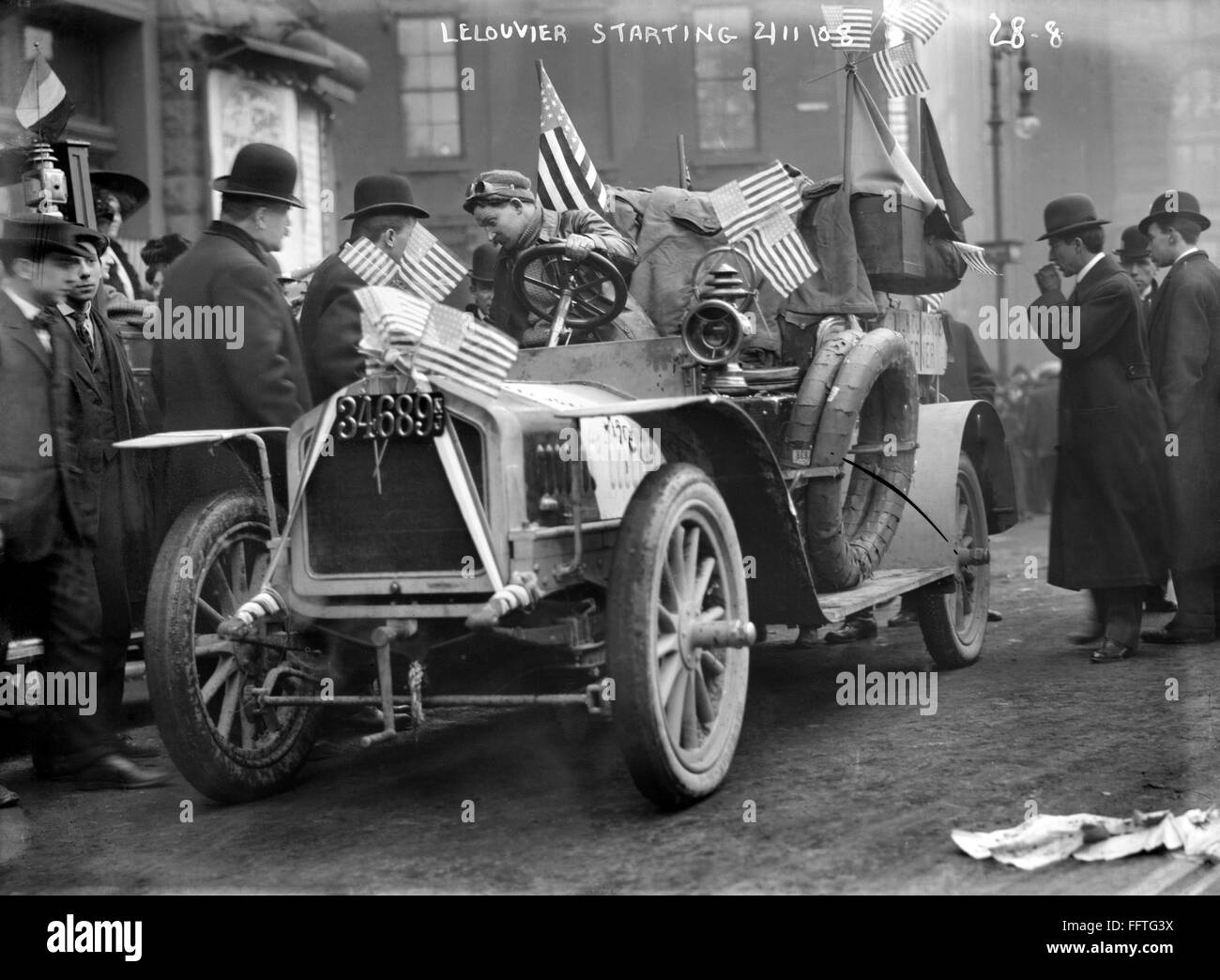 AUTOMOBILE RACE, 1908. /nLelouvier in his automobile in Time Square ...