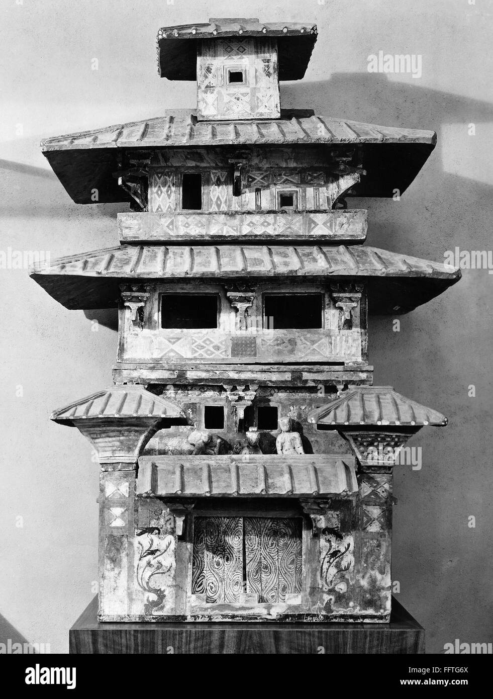 CHINA: TOMB MODEL. /nPainted earthenware tomb model of a multi-storied ...