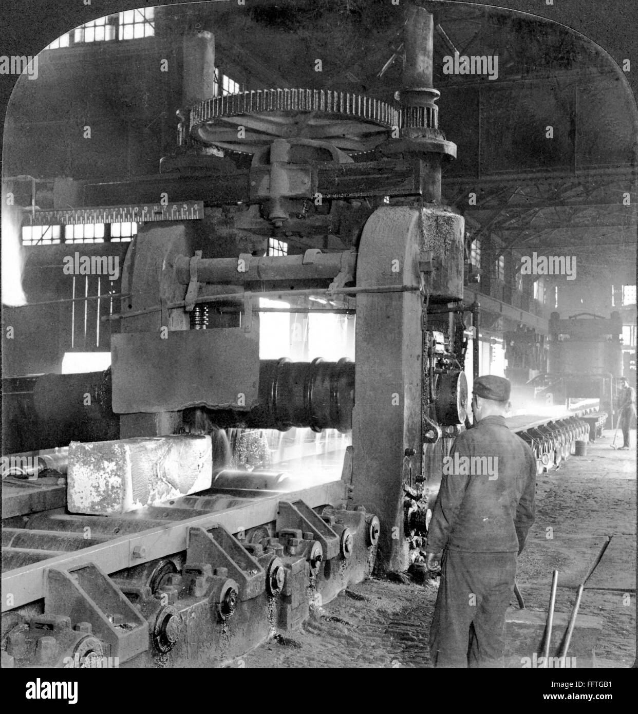 STEEL FACTORY, c1907. /nA white-hot ingot of steel on a conveyor belt ...