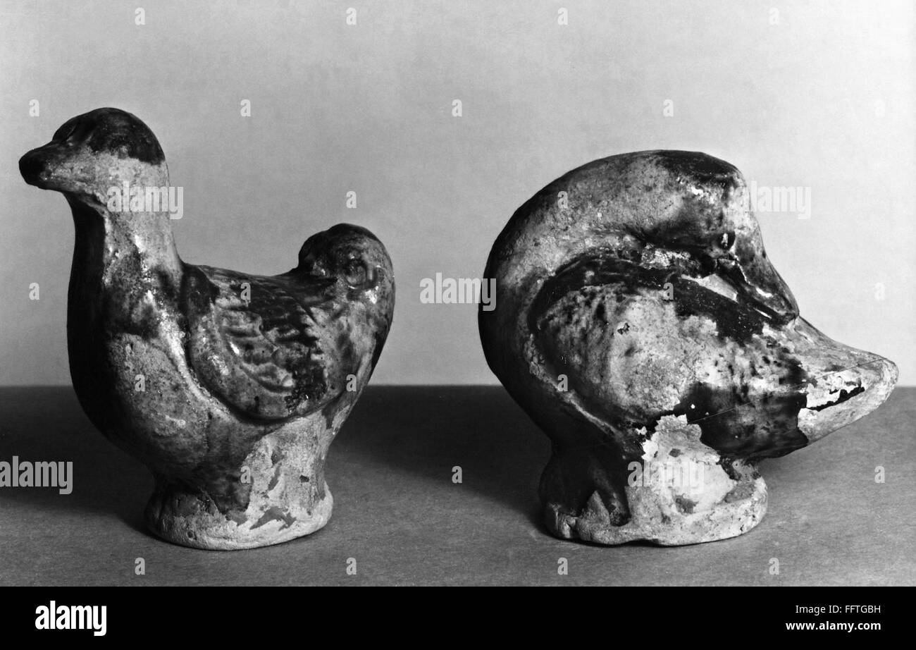 CHINA: TOMB FIGURES. /nA pair of earthenware duck tomb figures ...