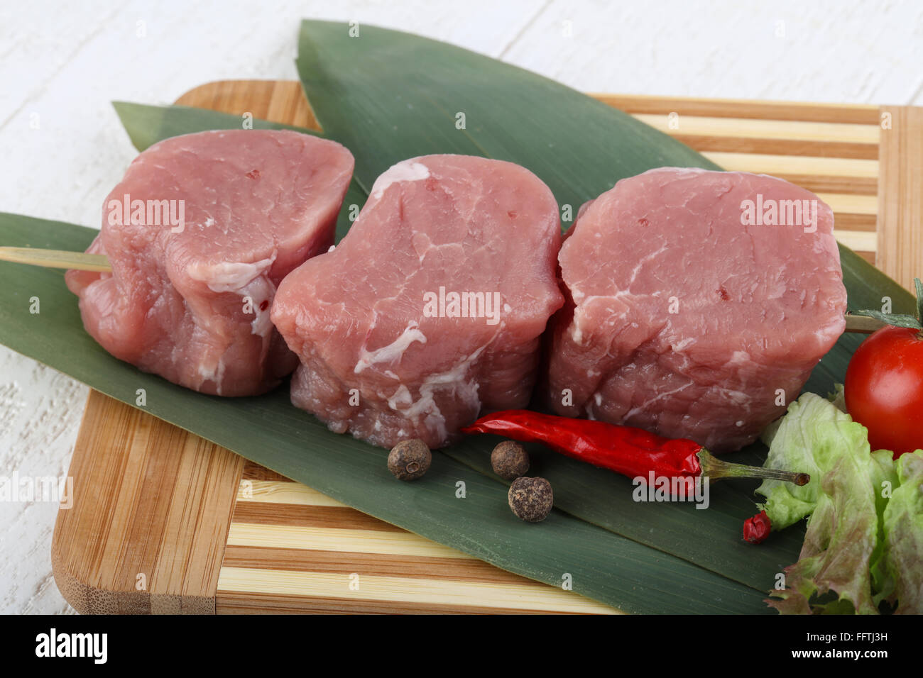 Raw pork fillet mignon ready for cooking Stock Photo - Alamy