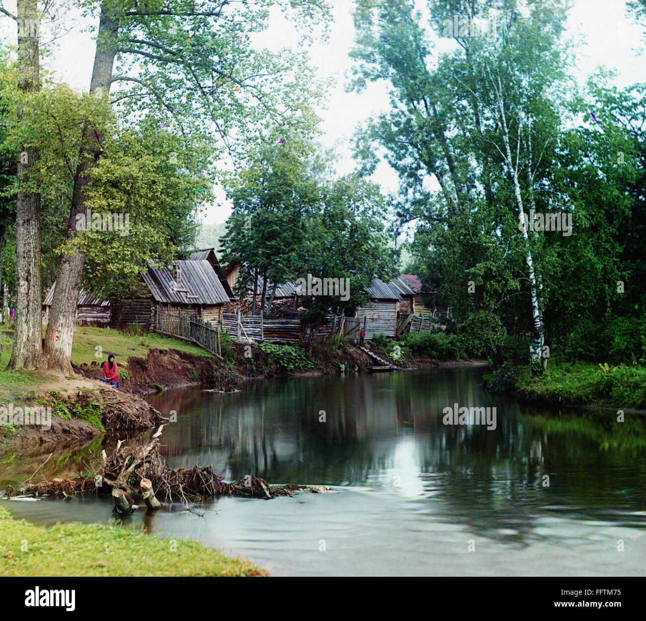 RUSSIA: LOG CABINS, 1910. /nA log cabin village along the Sim River ...