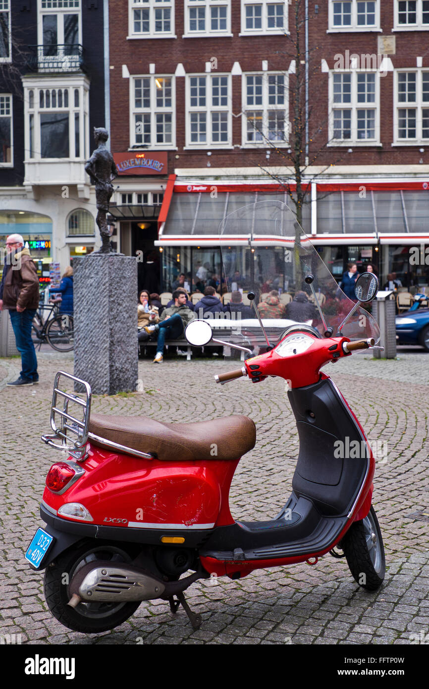 Red Vespa scooter in Amsterdam, the Netherlands Stock Photo - Alamy