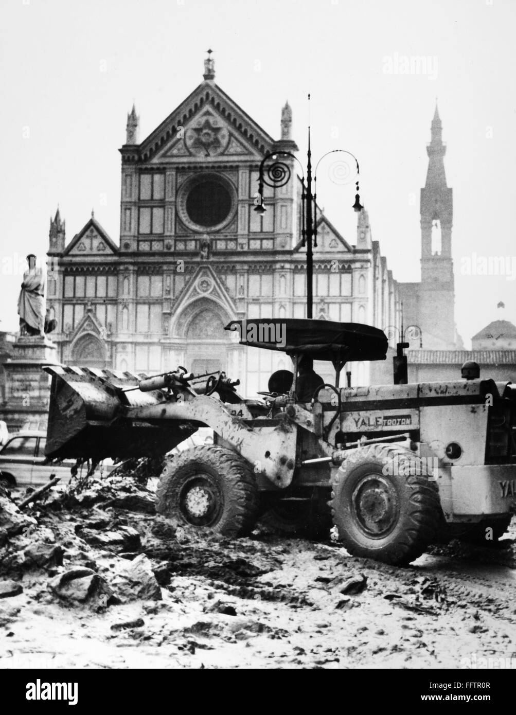 FLORENCE: FLOOD, 1966. /nA bulldozer clearing mud and debris from a ...