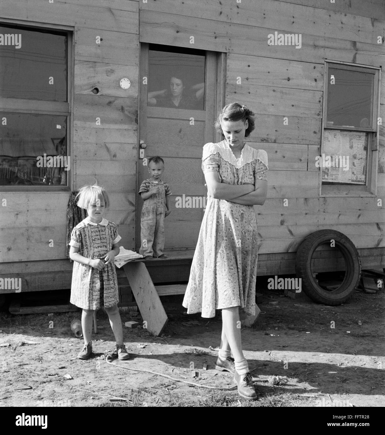 MIGRANT MOTHER, 1939. /nA young mother and two children living in a ...