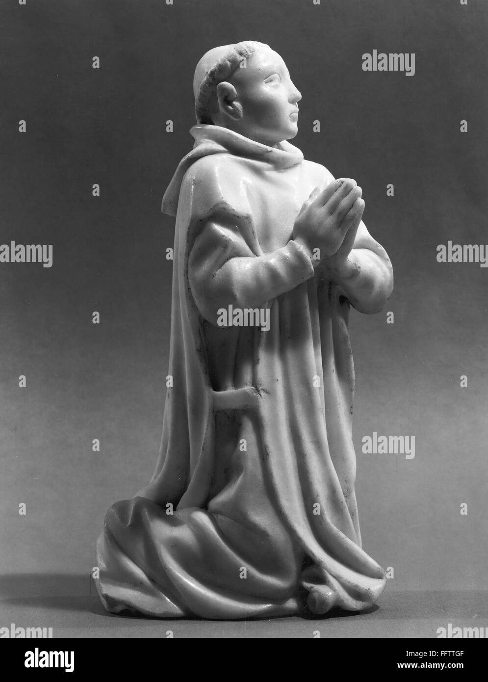 MONK PRAYING. /nMarble sculpture of a Carthusian monk kneeling in ...