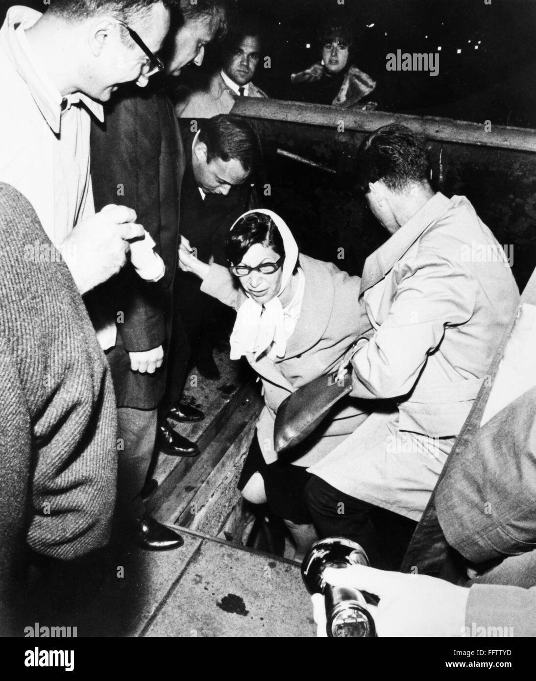 NEW YORK: BLACKOUT, 1965. /nA passenger climbs out of an emergency ...