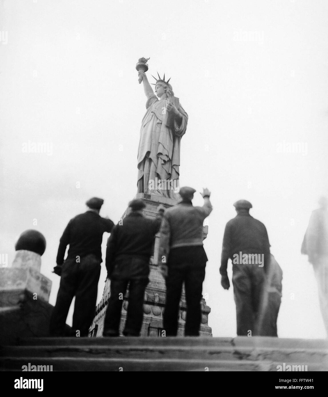 STATUE OF LIBERTY, c1938. /nWorkers saluting the statue in New York ...