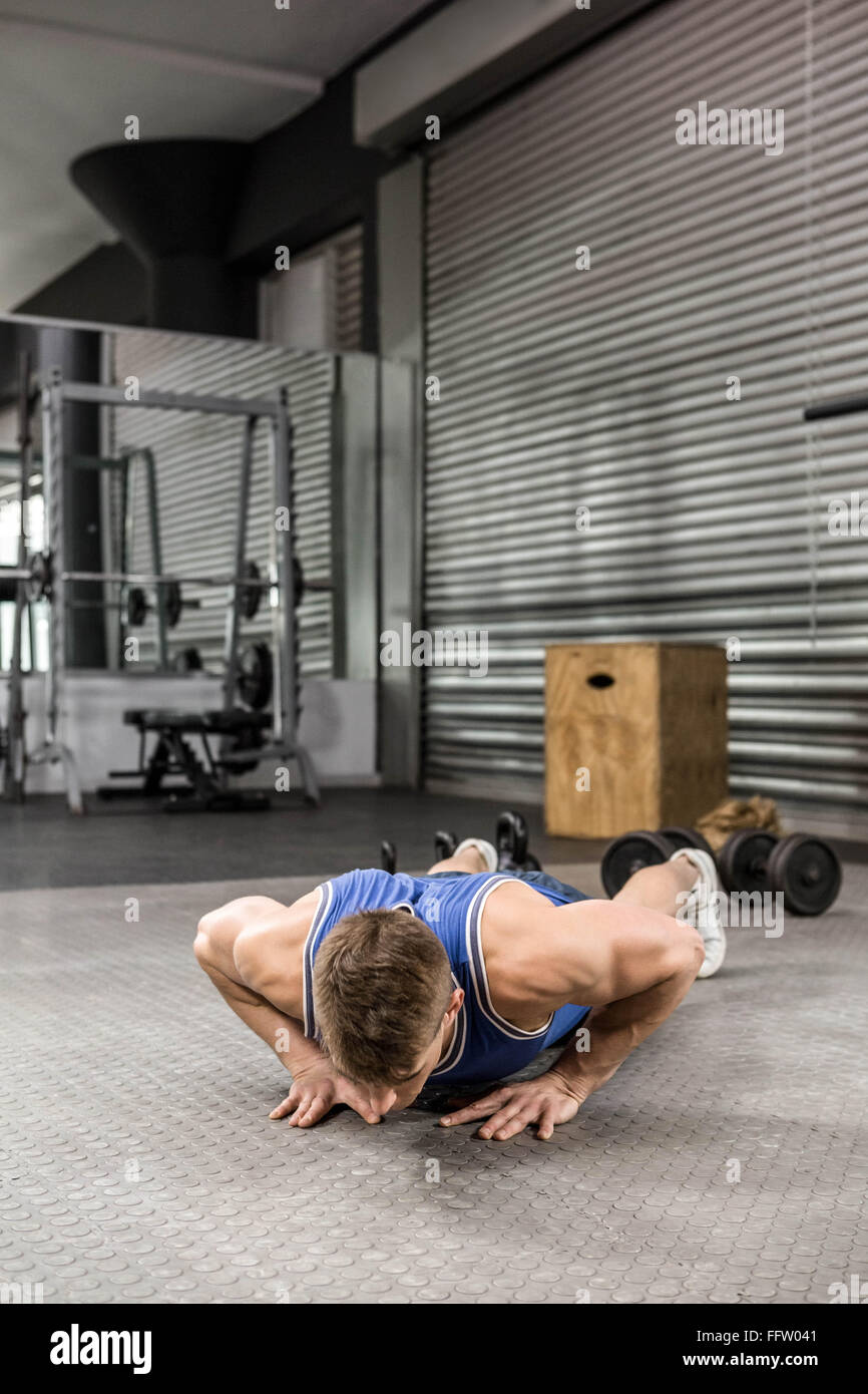 Muscular man doing push up Stock Photo - Alamy