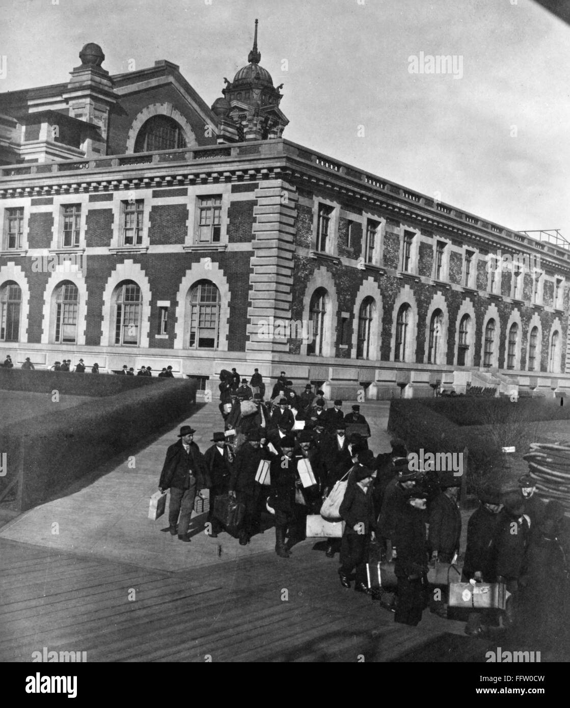 ELLIS ISLAND: IMMIGRANTS. /nImmigrants wainting for a boat after having ...