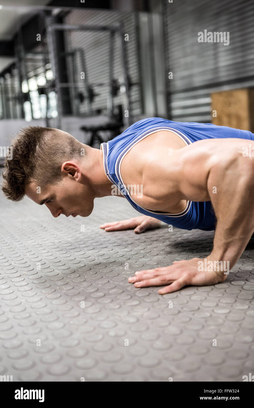 Muscular man doing push up Stock Photo - Alamy