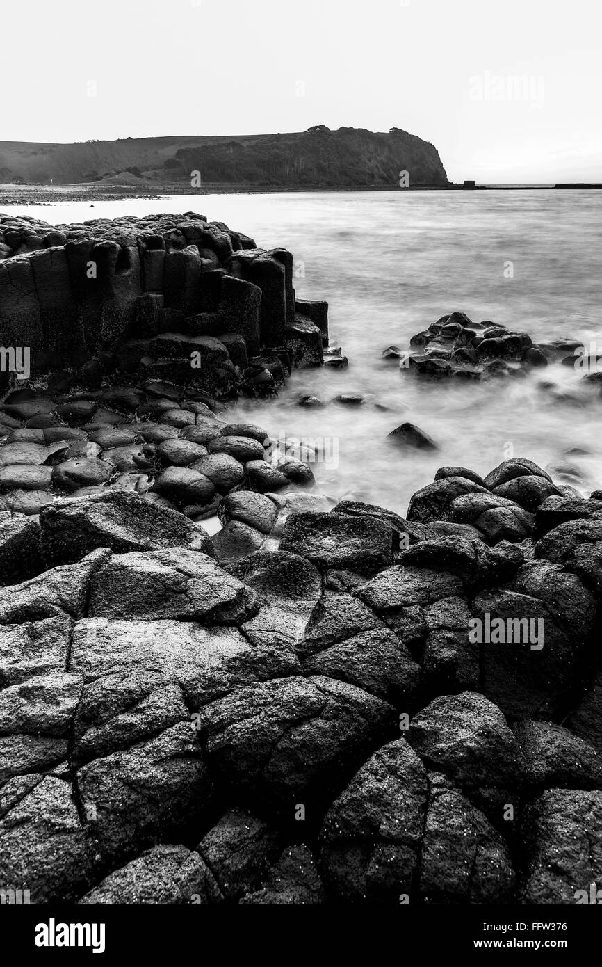 Coles Beach, Devonport at low tide in black and white. The ...