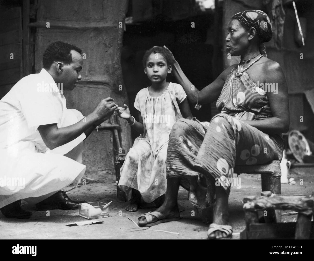 SOMALIA: MALARIA, 1970. /nA health inspector takes a blood sample from ...