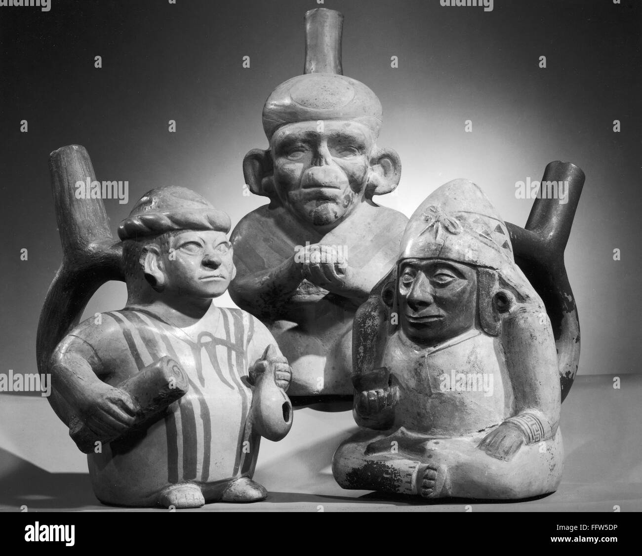 PERU: MOCHE POTTERY. /nFrom left: sitting woman, kneeling lepper ...