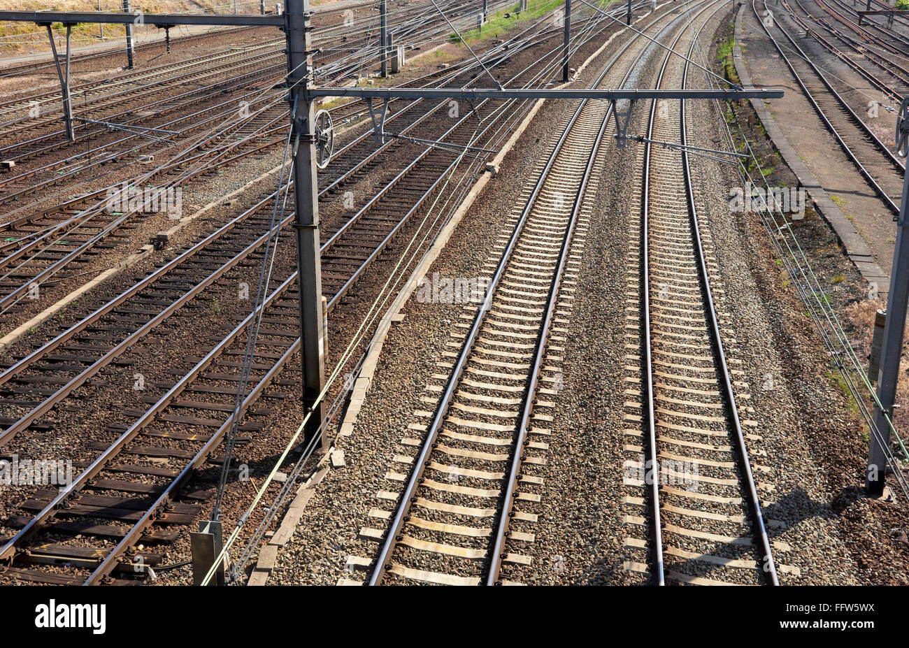 Railway area with rails and wires Stock Photo - Alamy