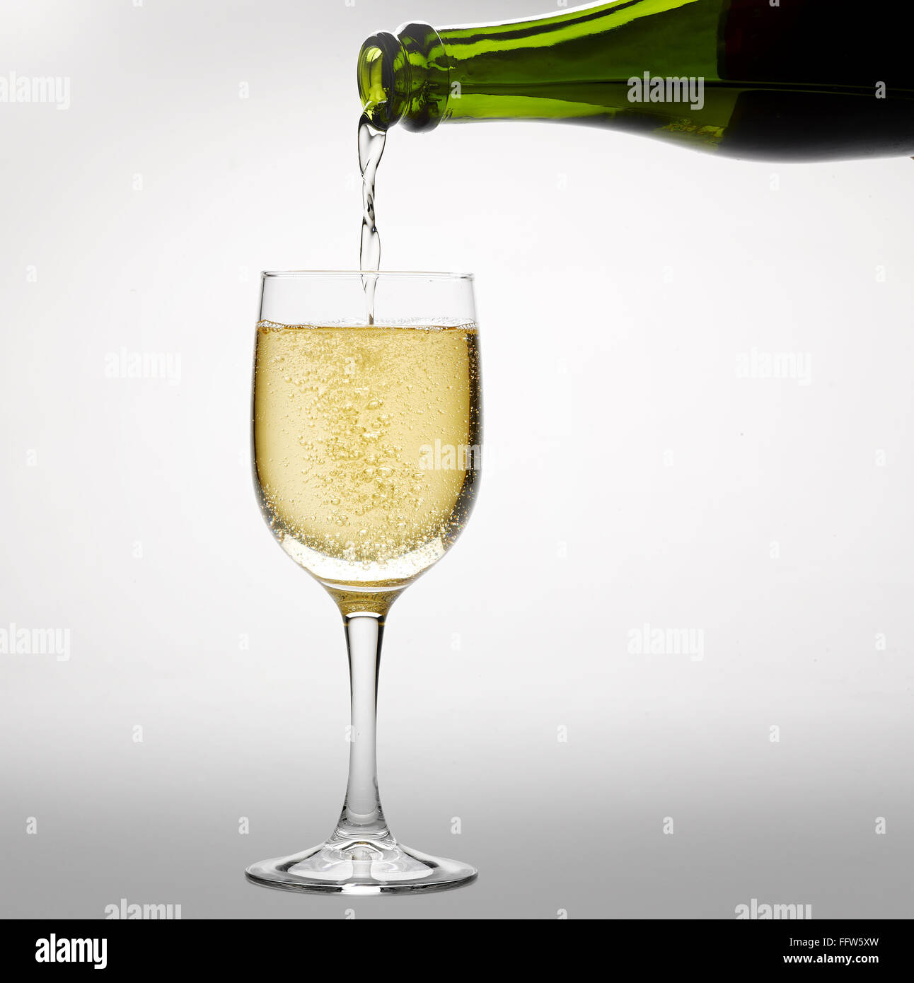 Pouring sparkling wine into glass hi-res stock photography and images ...