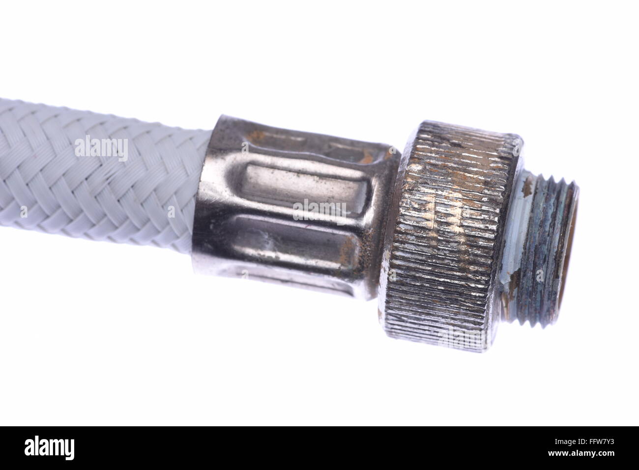 Old flexible metal hose pipe isolated on with white background Stock ...